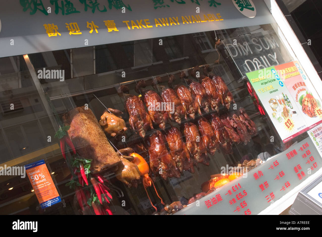 Roast duck in restaurant window in Gerrard Street Chinatown London ...