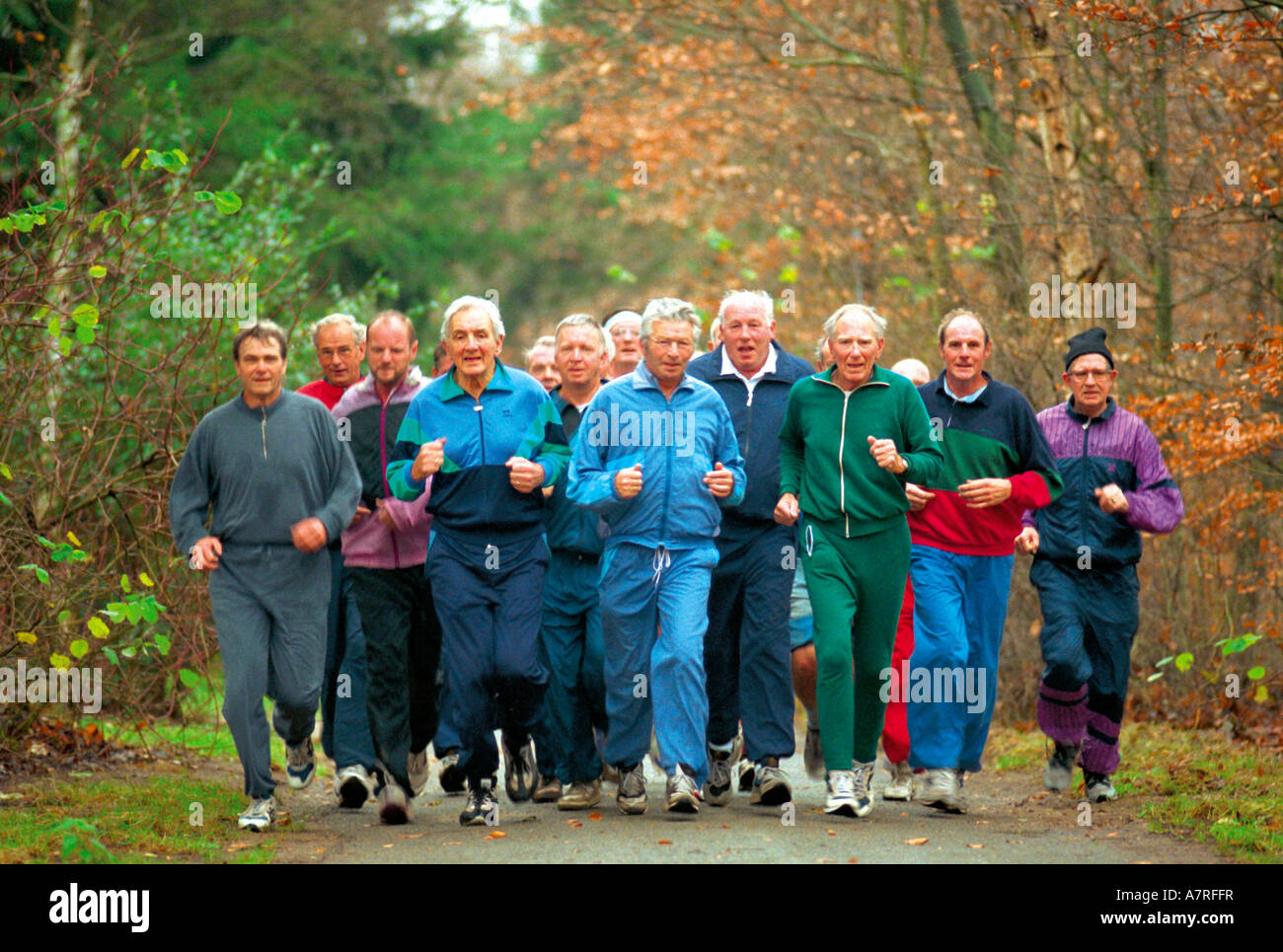 Senior men jogging in park Stock Photo - Alamy