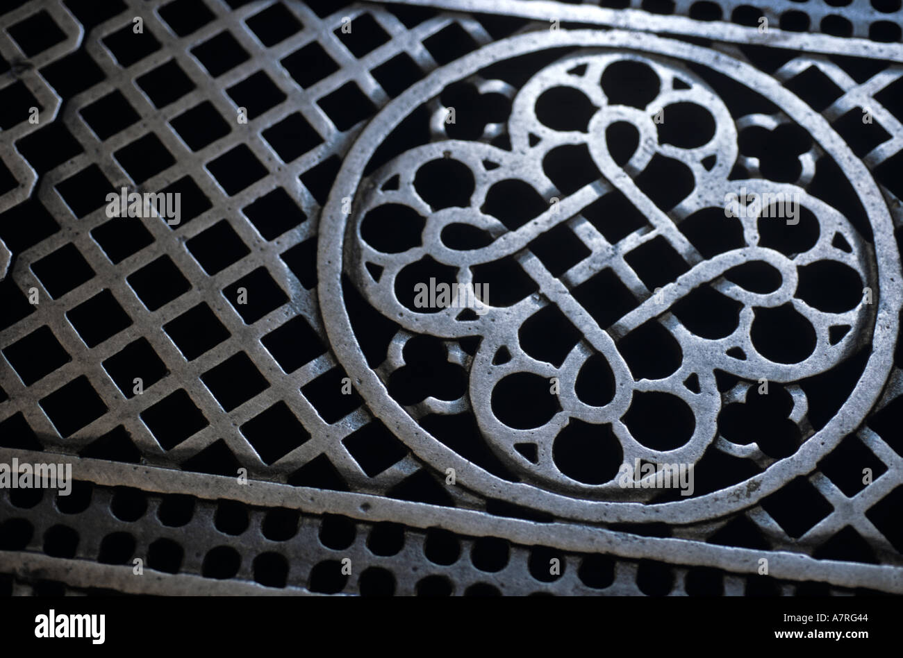 close up of decorative wrought iron floor grid at Southwark Cathedral ...