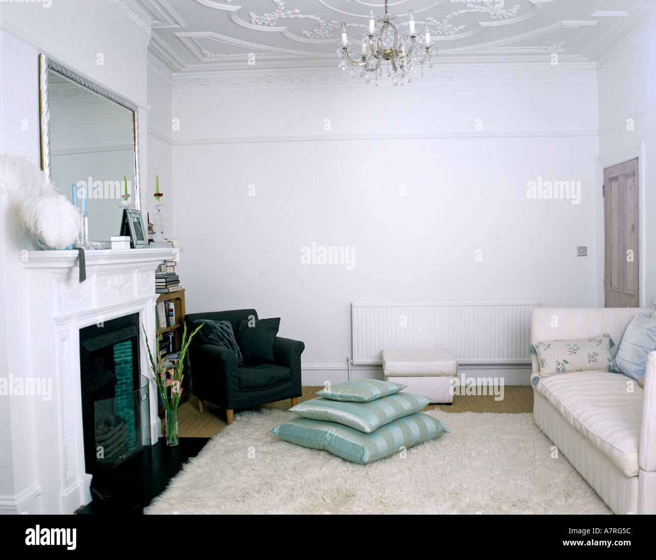 living room painted white with traditional fireplace shag pile rug sofa ...