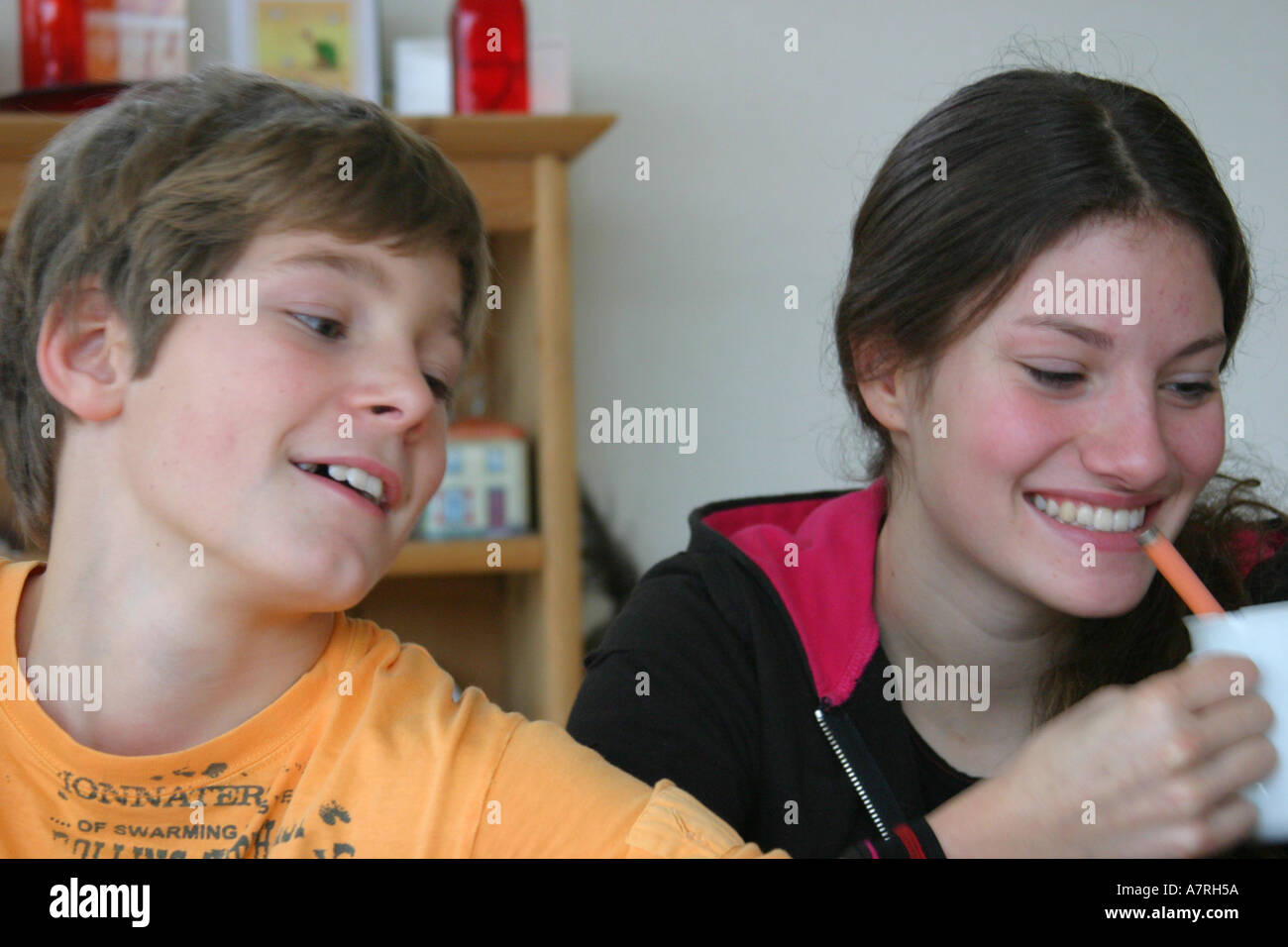 Brother and sister having fun Stock Photo - Alamy