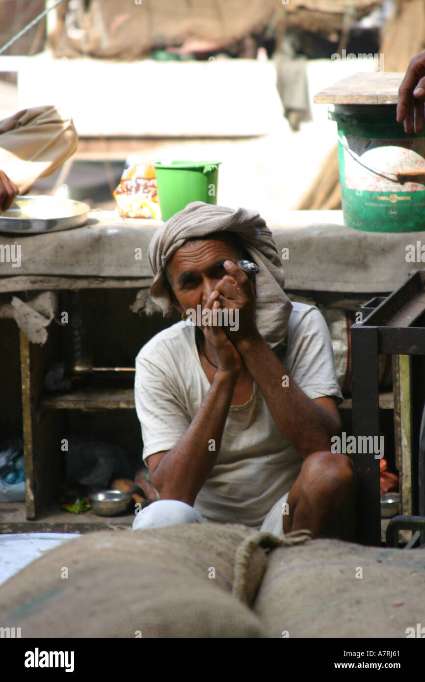 Poor man in Delhi India Stock Photo - Alamy