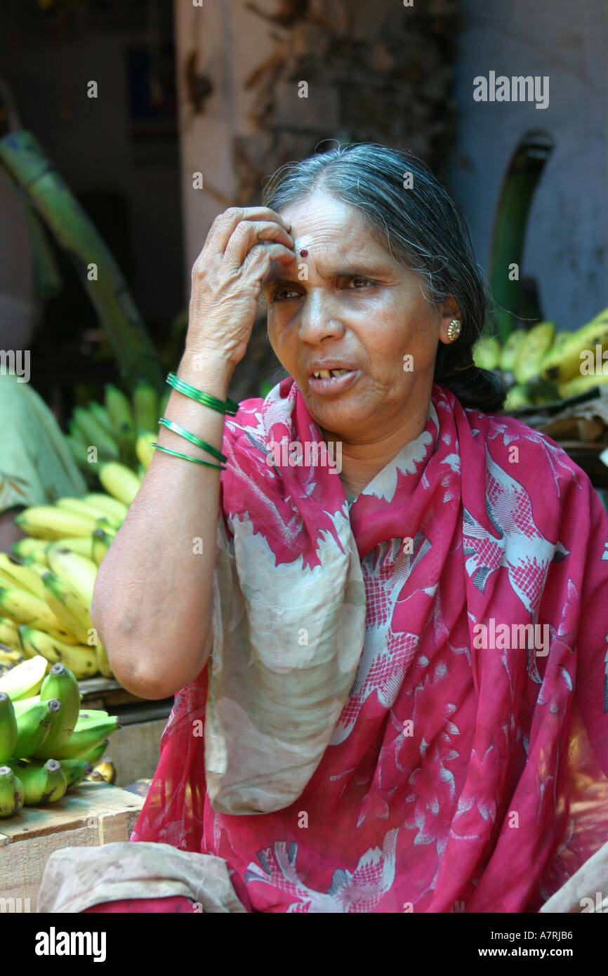 Woman at a market stall in Mysore India Stock Photo - Alamy