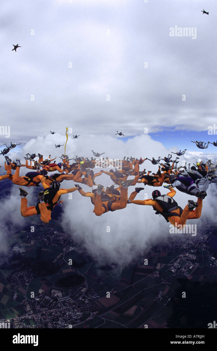 Group of people parachuting in formation Stock Photo - Alamy