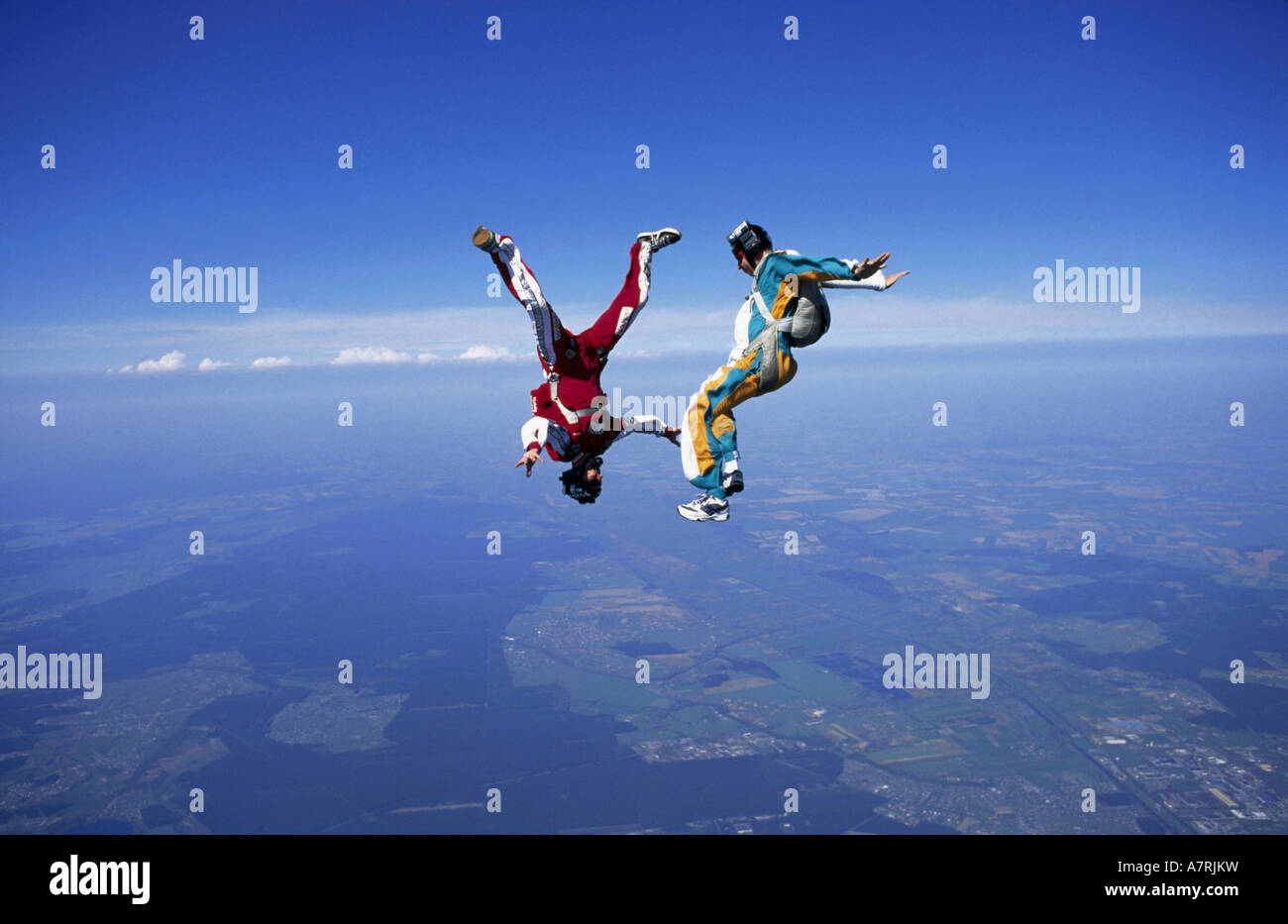 two people parachuting mid air Stock Photo - Alamy