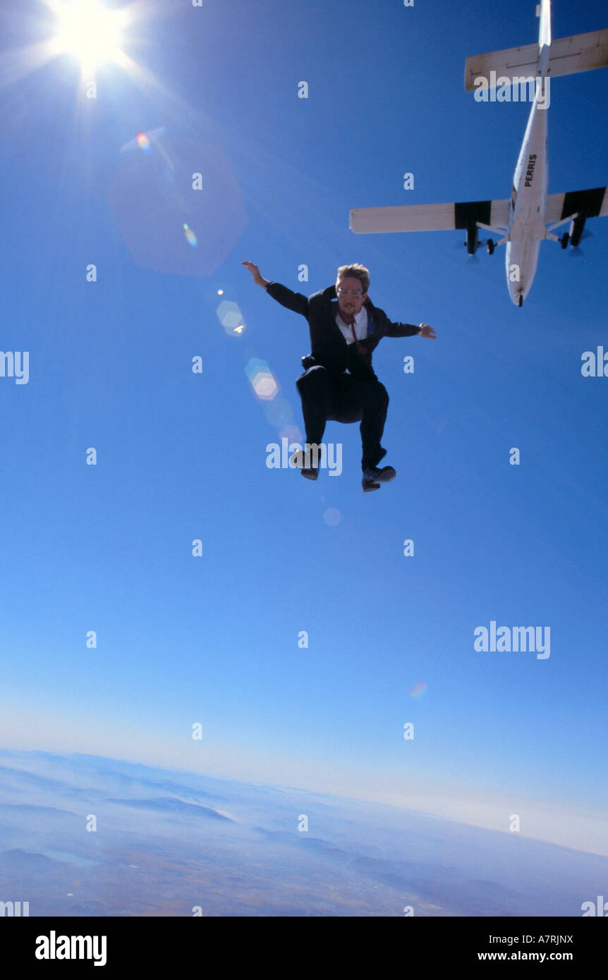 Man free falling, low angle view Stock Photo - Alamy