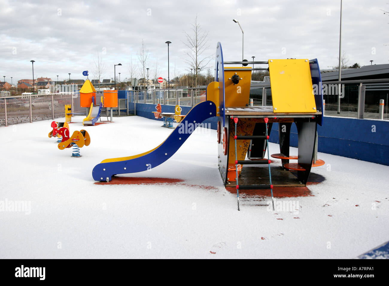 Children's playground in the snow Stock Photo - Alamy