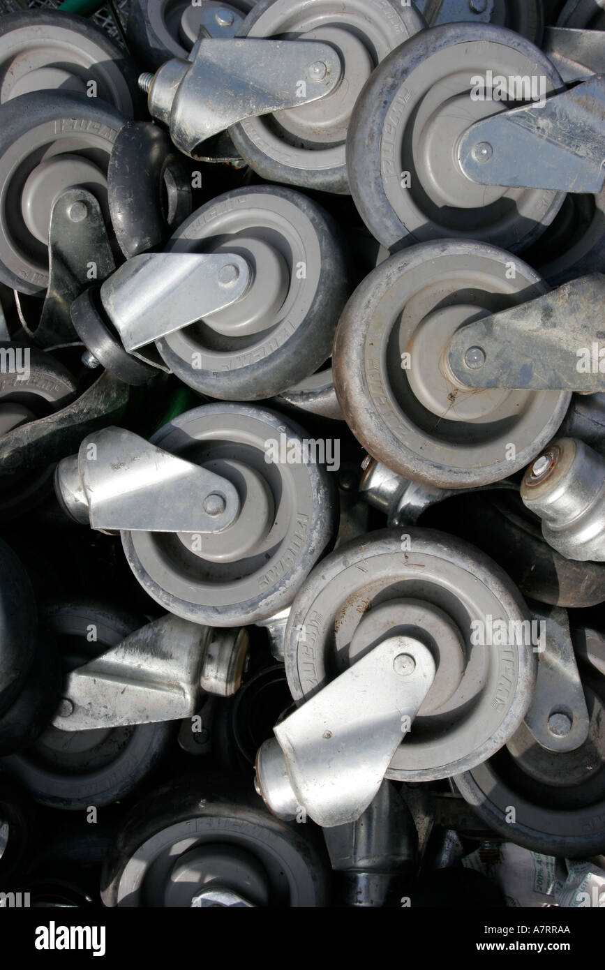 Supermarket trolley castor wheels Stock Photo - Alamy