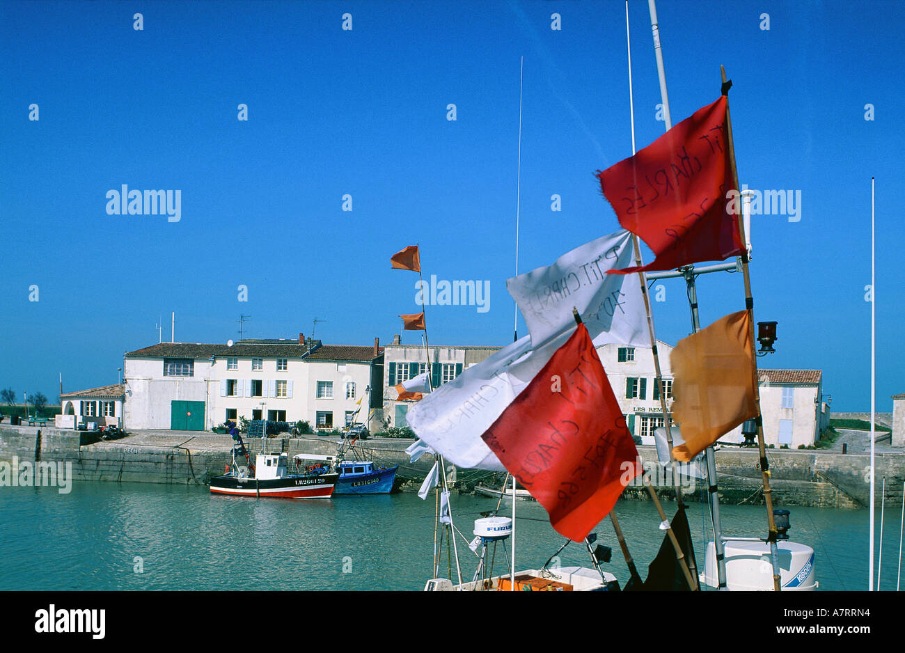 France, Charente Maritime, Re Island, harbour of Saint Martin, flags of ...