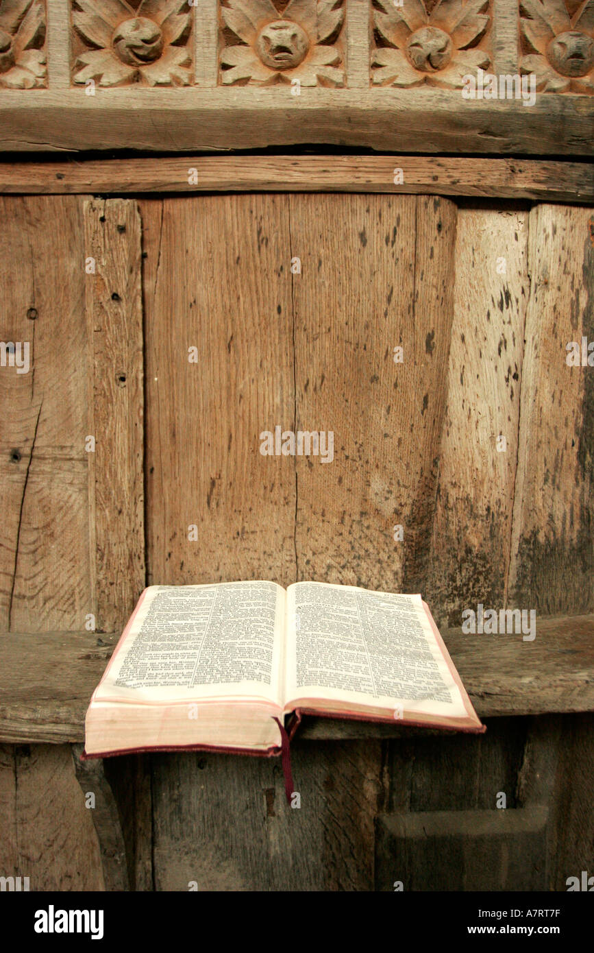 Prayer book open in church box pew Stock Photo - Alamy