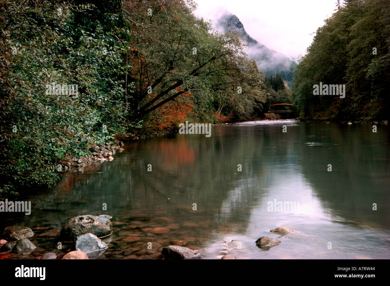 North Fork of the Snoqualmie River. Bridge and mountain in background ...