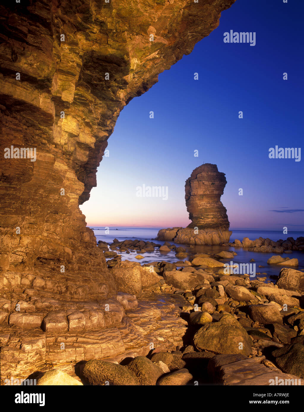Limestone sea stack at Whitburn on the South Tyneside coastline in the ...