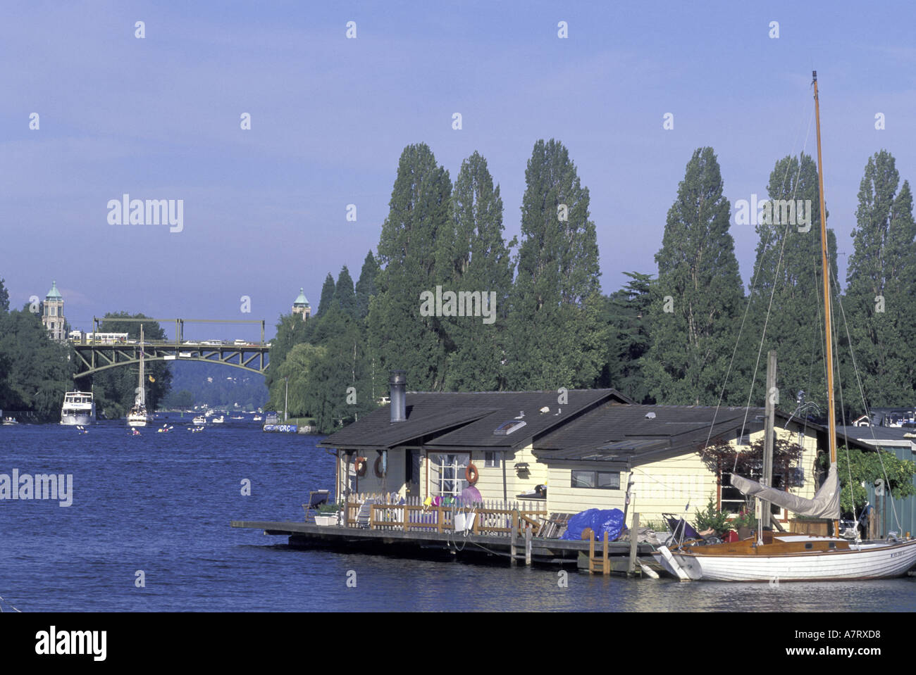 NA, USA, Washington, Seattle, Houseboat community and sailboat beneath ...