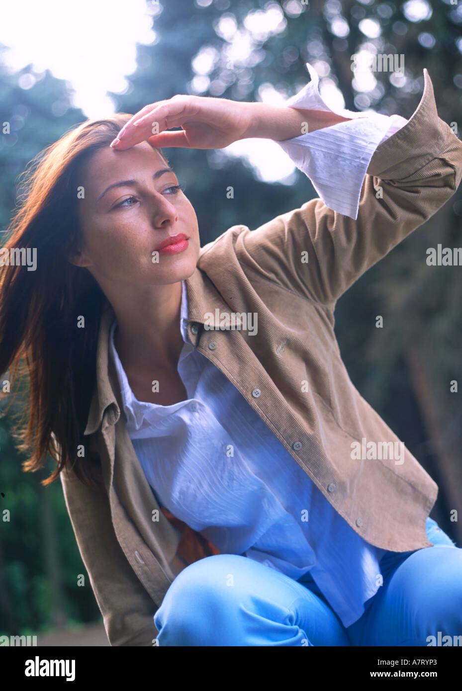 outdoor summer day park tree trees close up woman young girl 20 25 ...