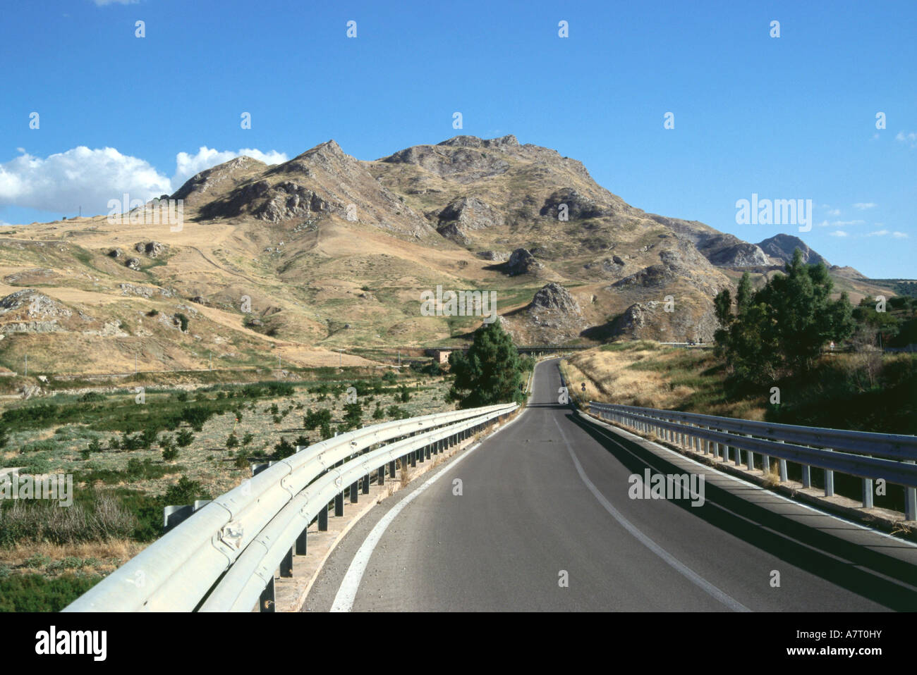Country road running through landscape, Agrigento, Sicily, Italy Stock ...