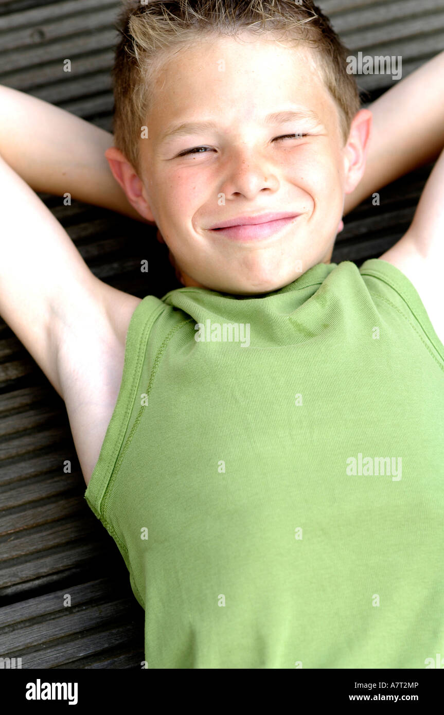 High angle view of teenage boy smiling Stock Photo - Alamy