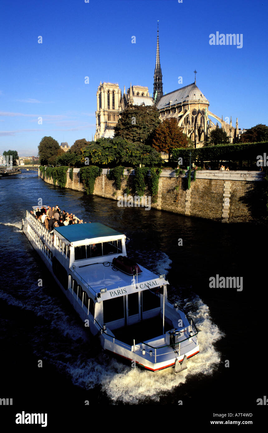 France, Paris, river boat passing by Notre Dame cathedral Stock Photo ...