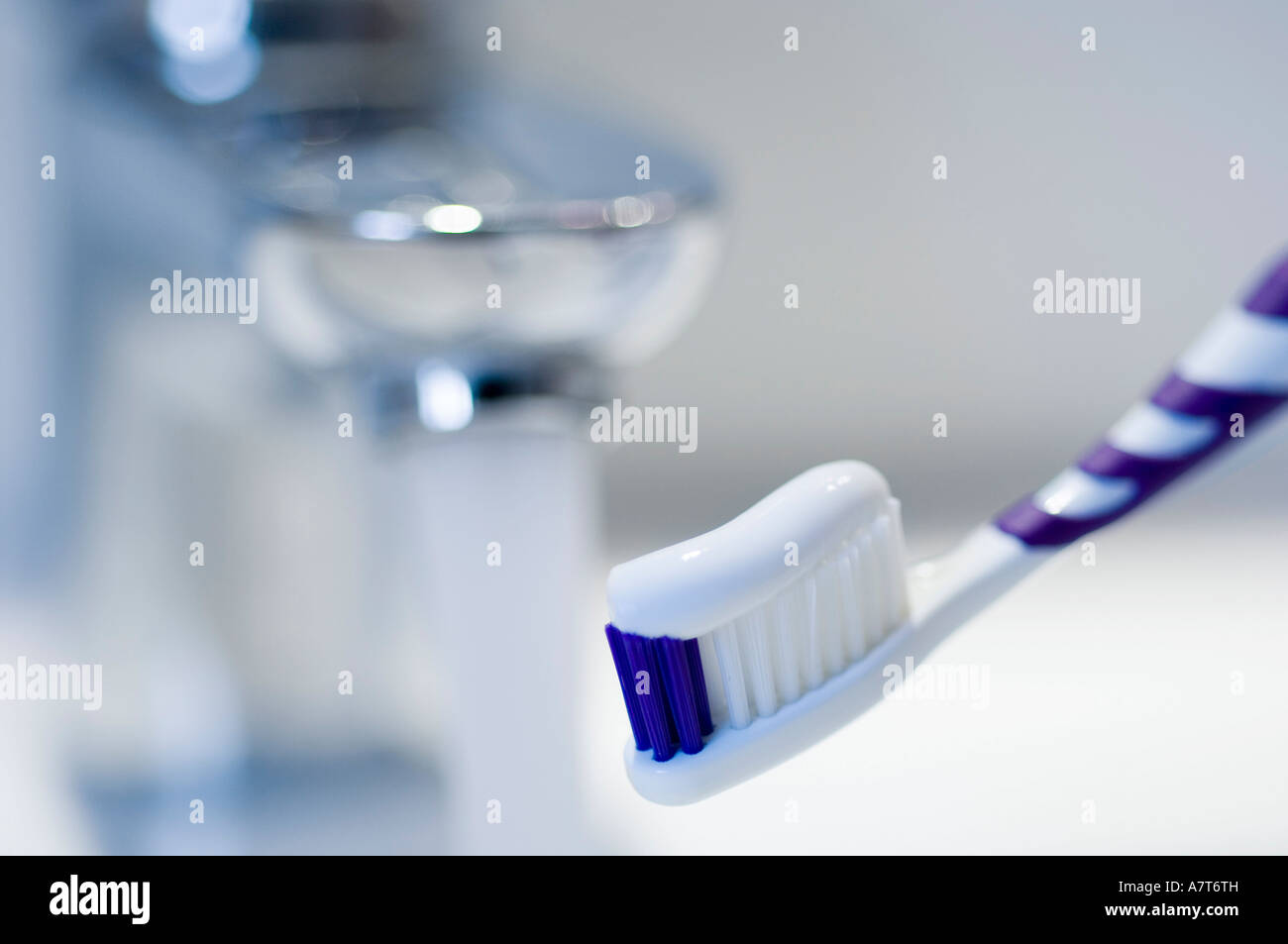 Close-up of toothpaste on toothbrush Stock Photo - Alamy