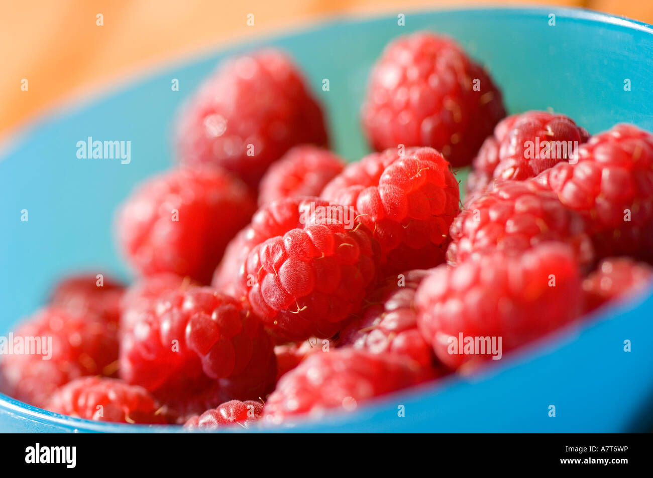 bowl of raspberries, close-up Stock Photo - Alamy