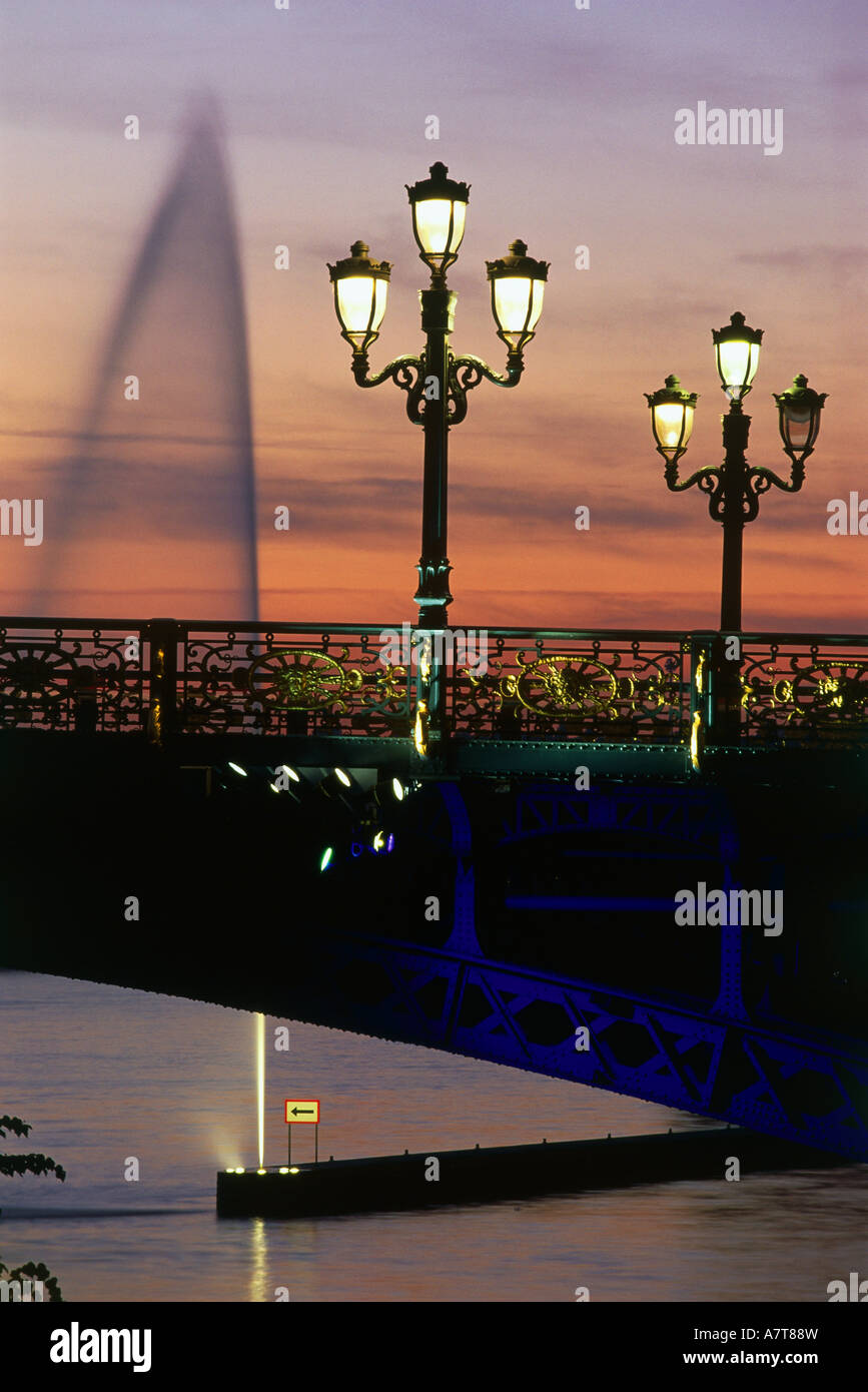 Lit up lampposts on bridge during dusk, Arch Bridge, Belgium Stock ...
