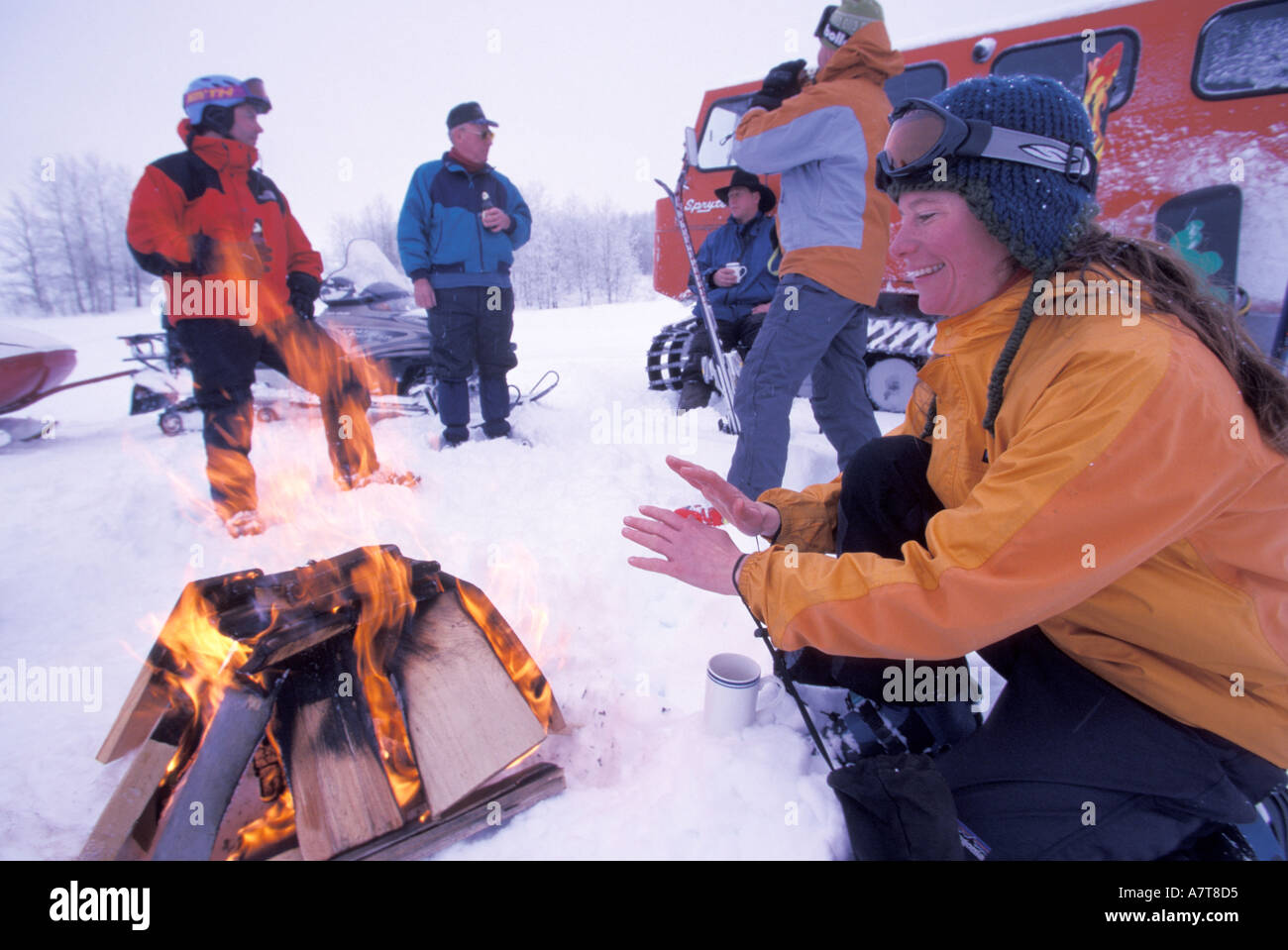 Gathered around fire hi-res stock photography and images - Alamy