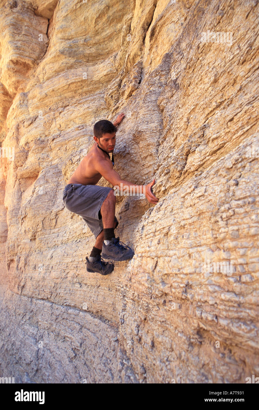 Man Rock Climbing With No Ropes Stock Photo - Alamy
