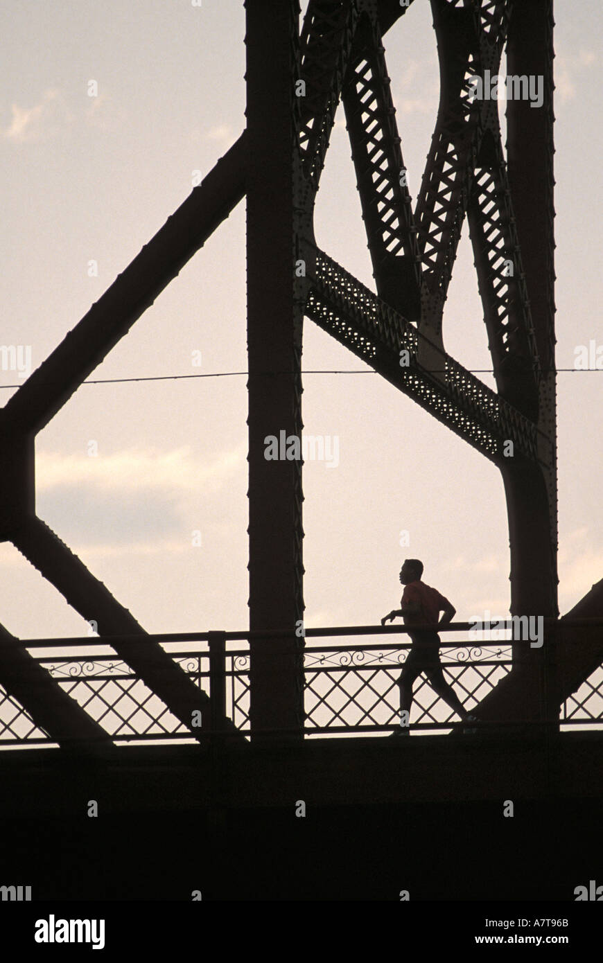 Man jogging on bridge hi-res stock photography and images - Alamy