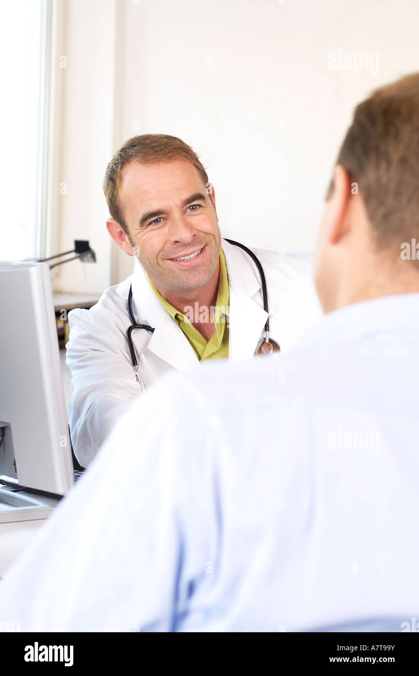 Doctor and patient from behind hi-res stock photography and images - Alamy