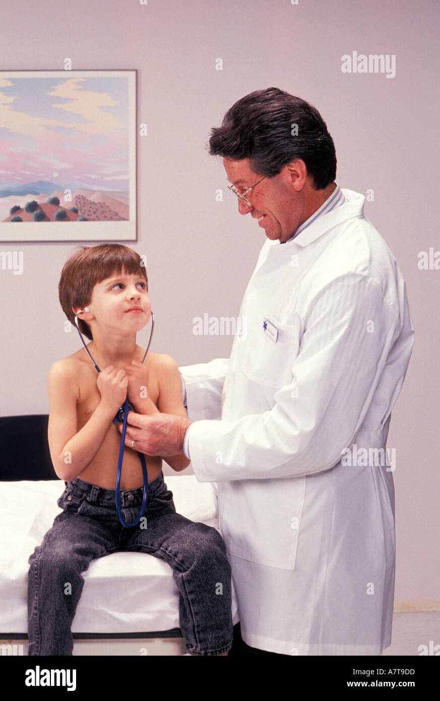 Doctor Letting Little Boy Use Stethoscope Stock Photo - Alamy