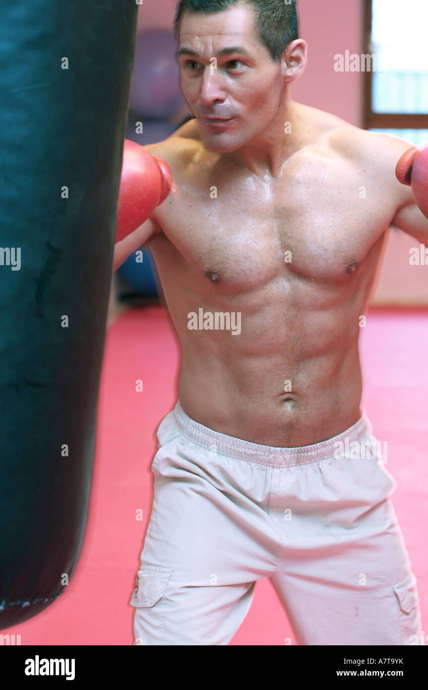 Male boxer practising punching hi-res stock photography and images - Alamy