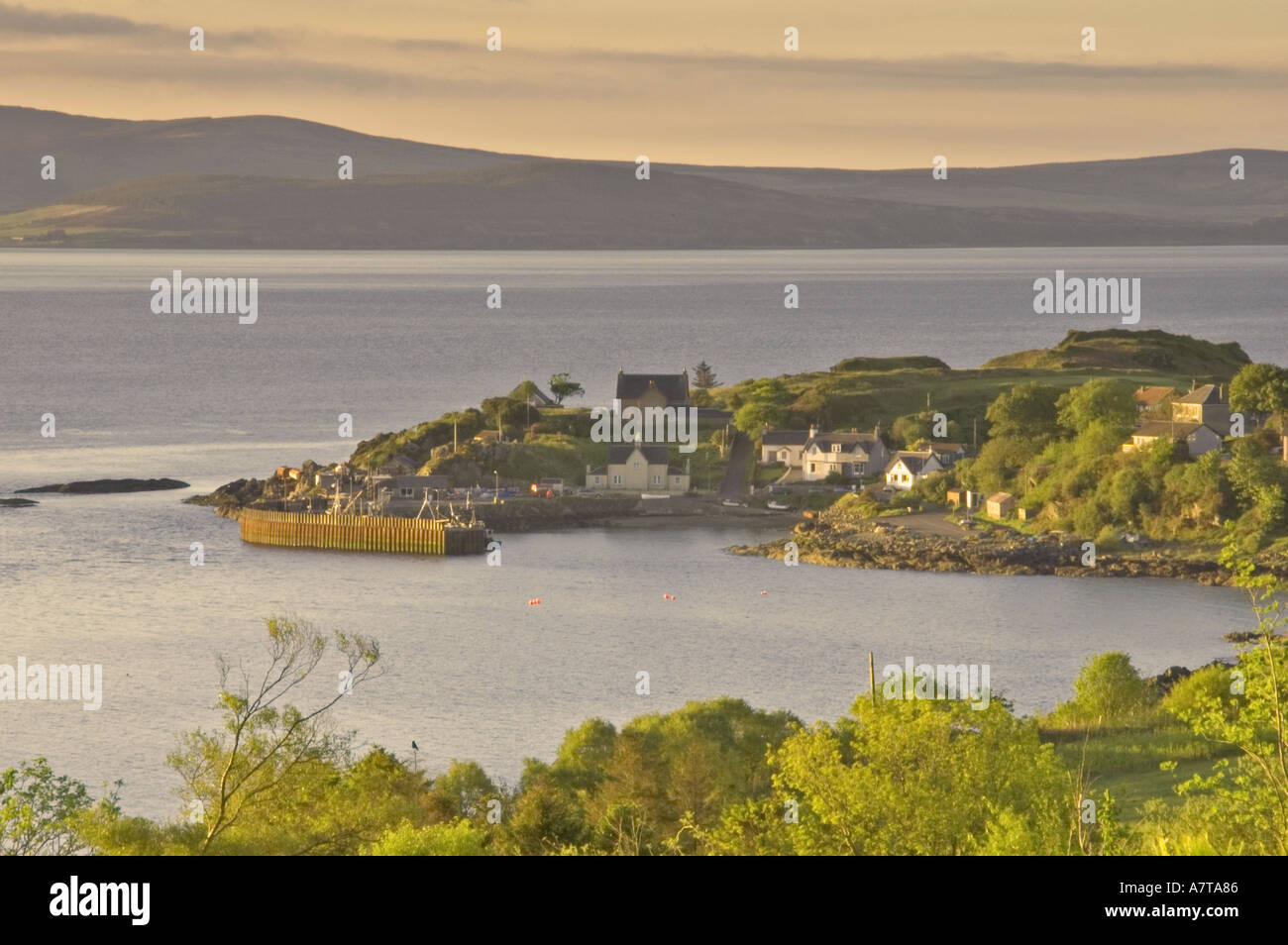 Looking across Carradale Harbour to Arran Stock Photo - Alamy