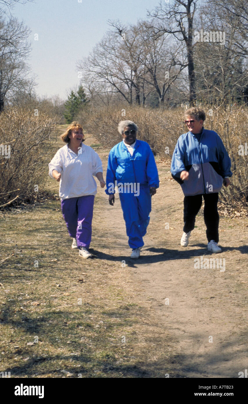 Black women walk autumn hi-res stock photography and images - Alamy
