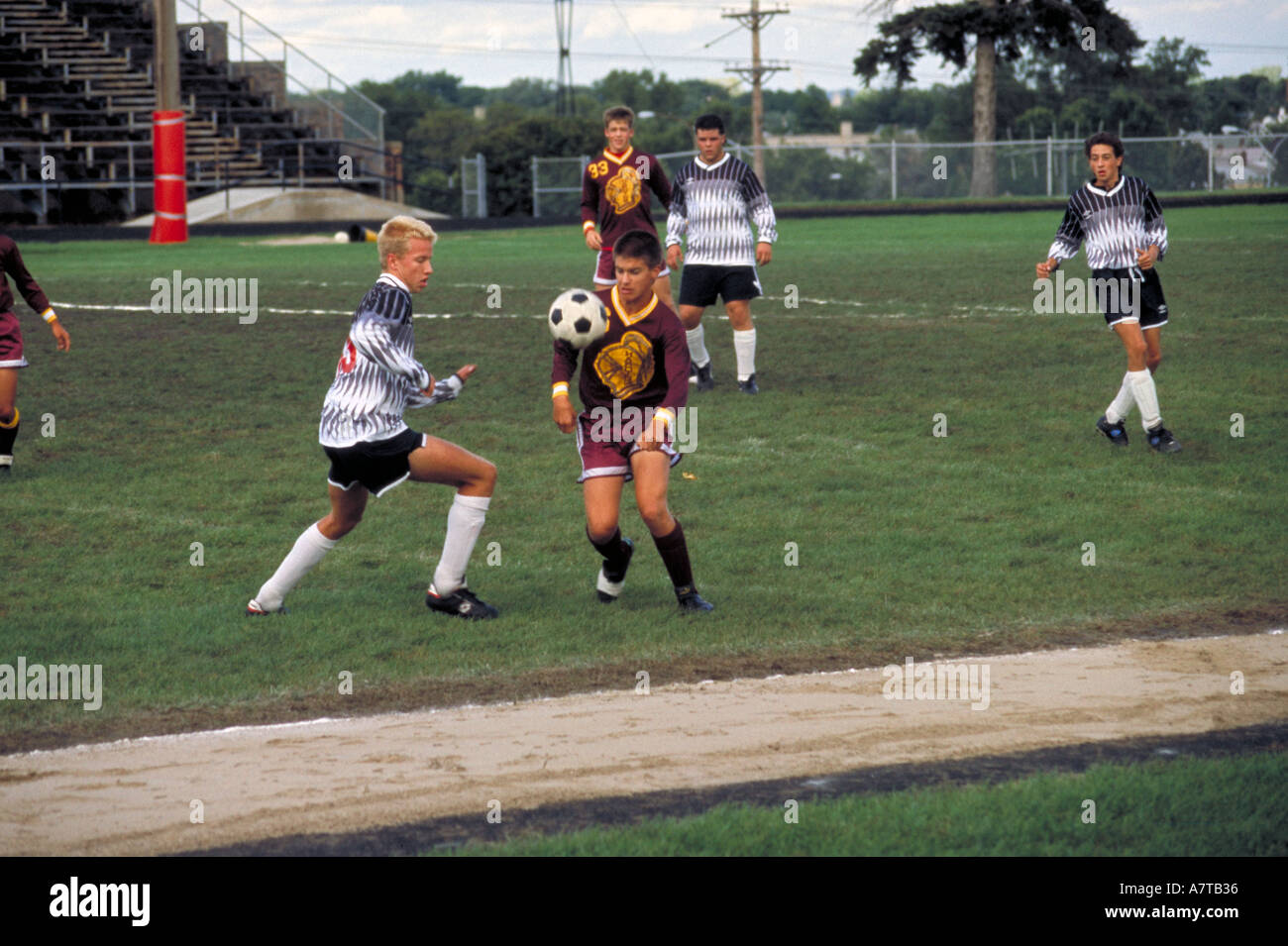 High school boys and soccer ball hi-res stock photography and images ...