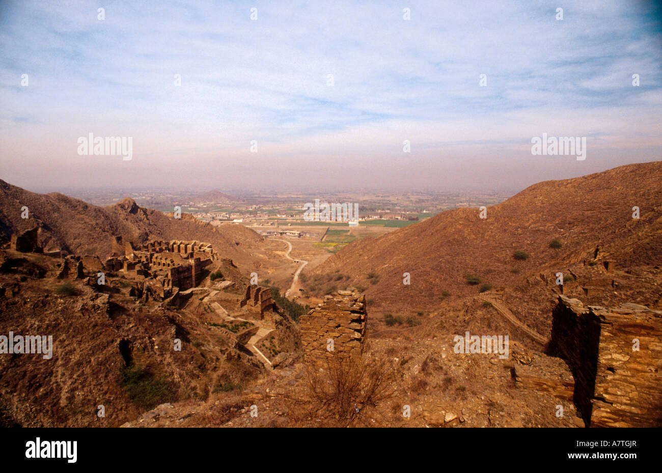 Ruins on mountain overlooking valley, Peshawar, Pakistan Stock Photo ...