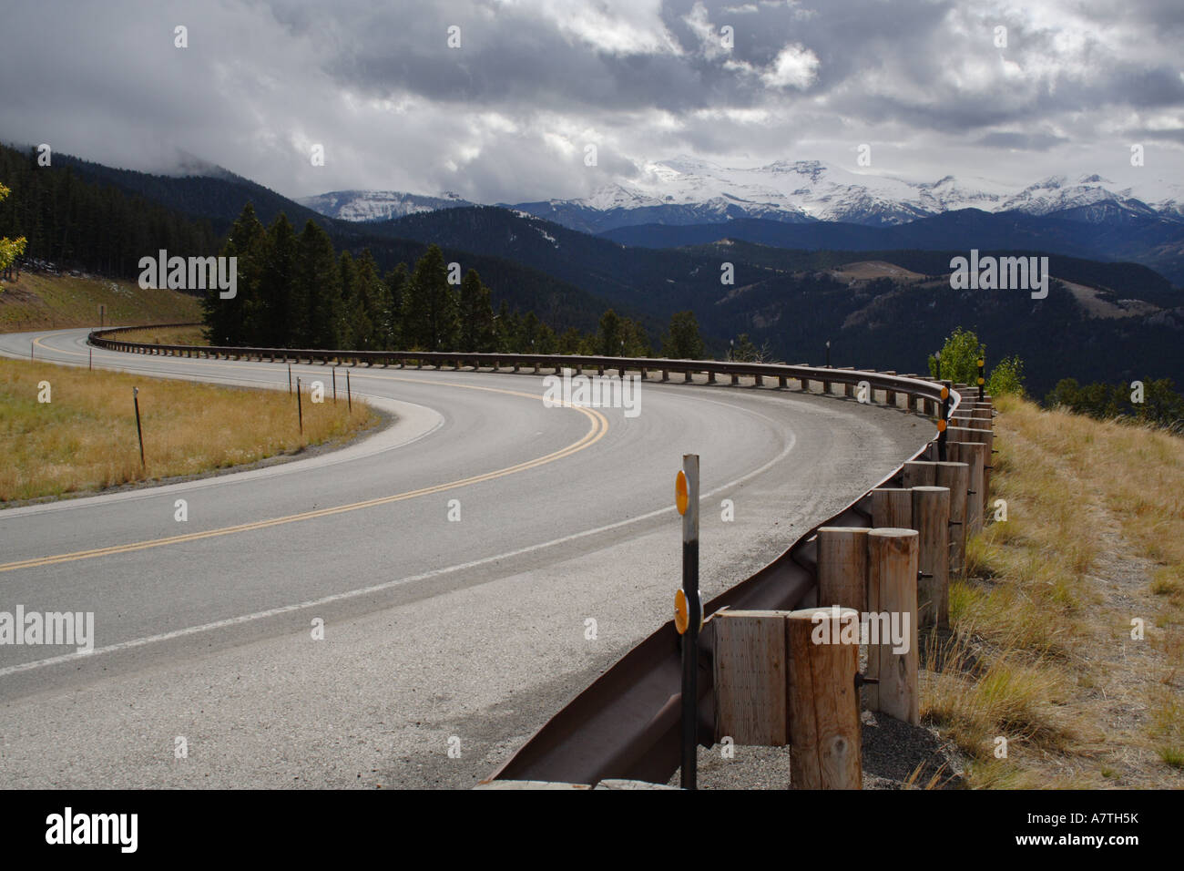 Wide open road to the mountains and sky Stock Photo - Alamy
