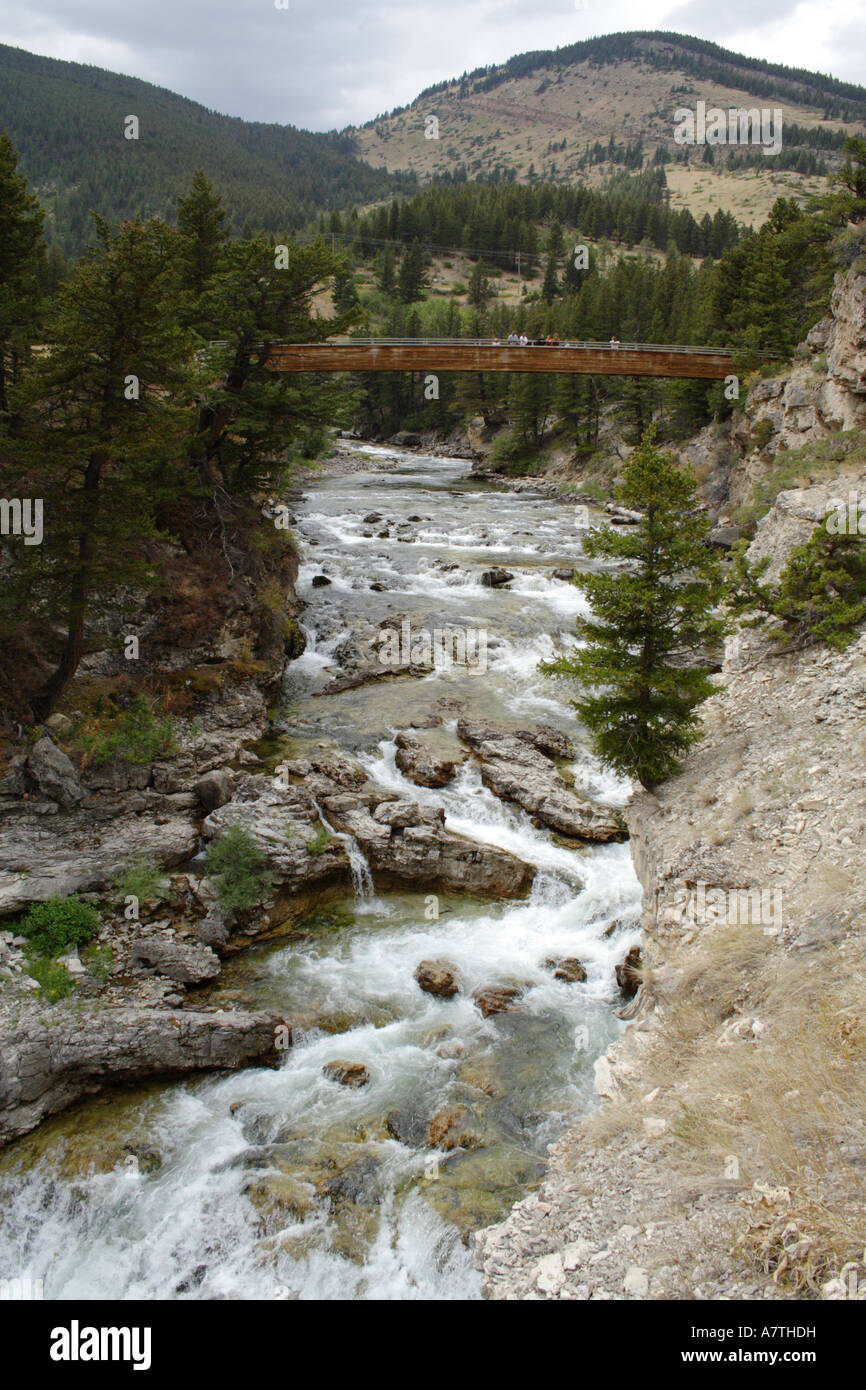bridge over blue ribbon river Stock Photo - Alamy