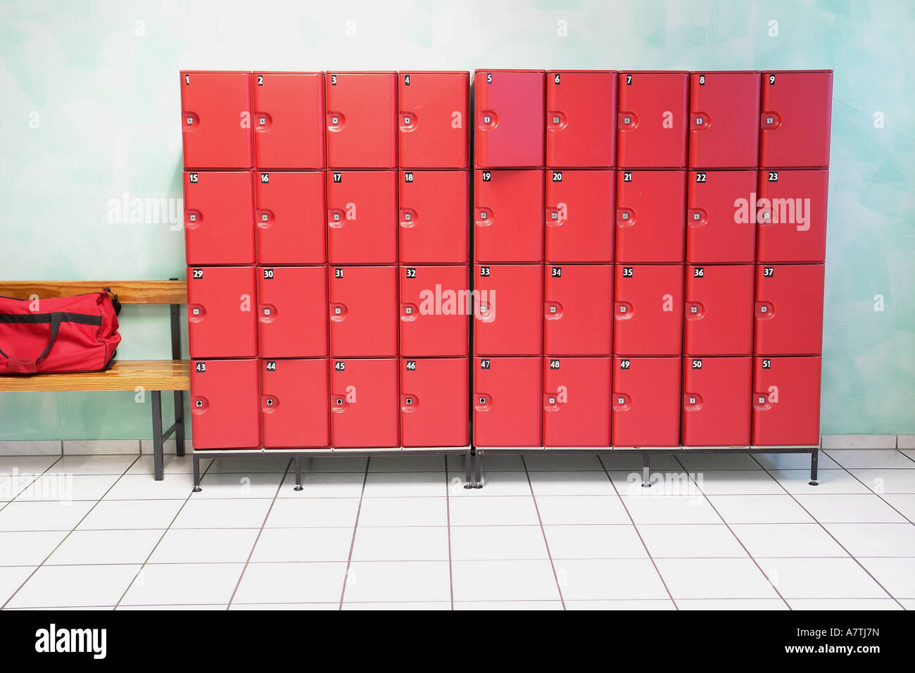 Rows of lockers in front of wall Stock Photo - Alamy