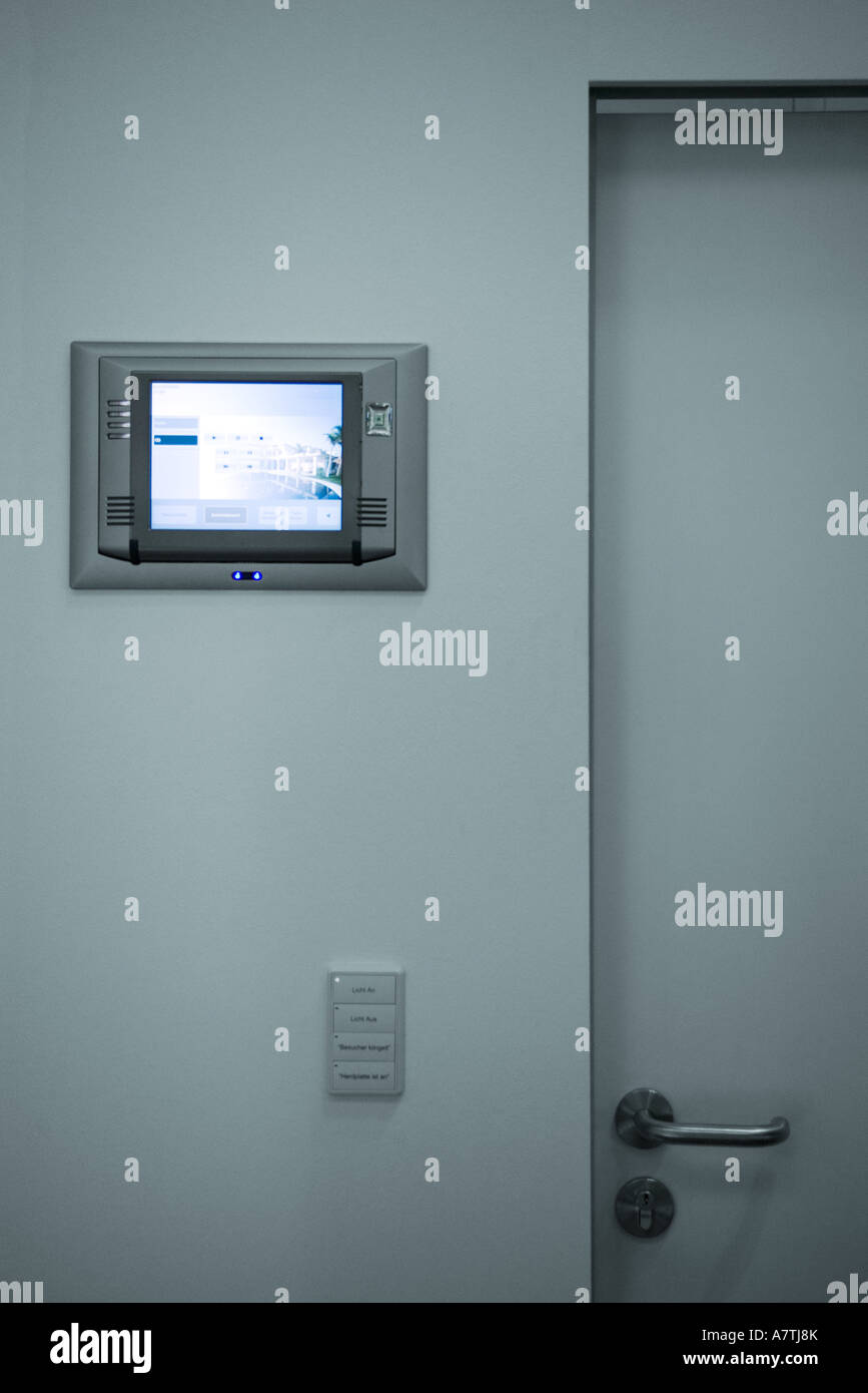 Surveillance screen on wall Stock Photo - Alamy