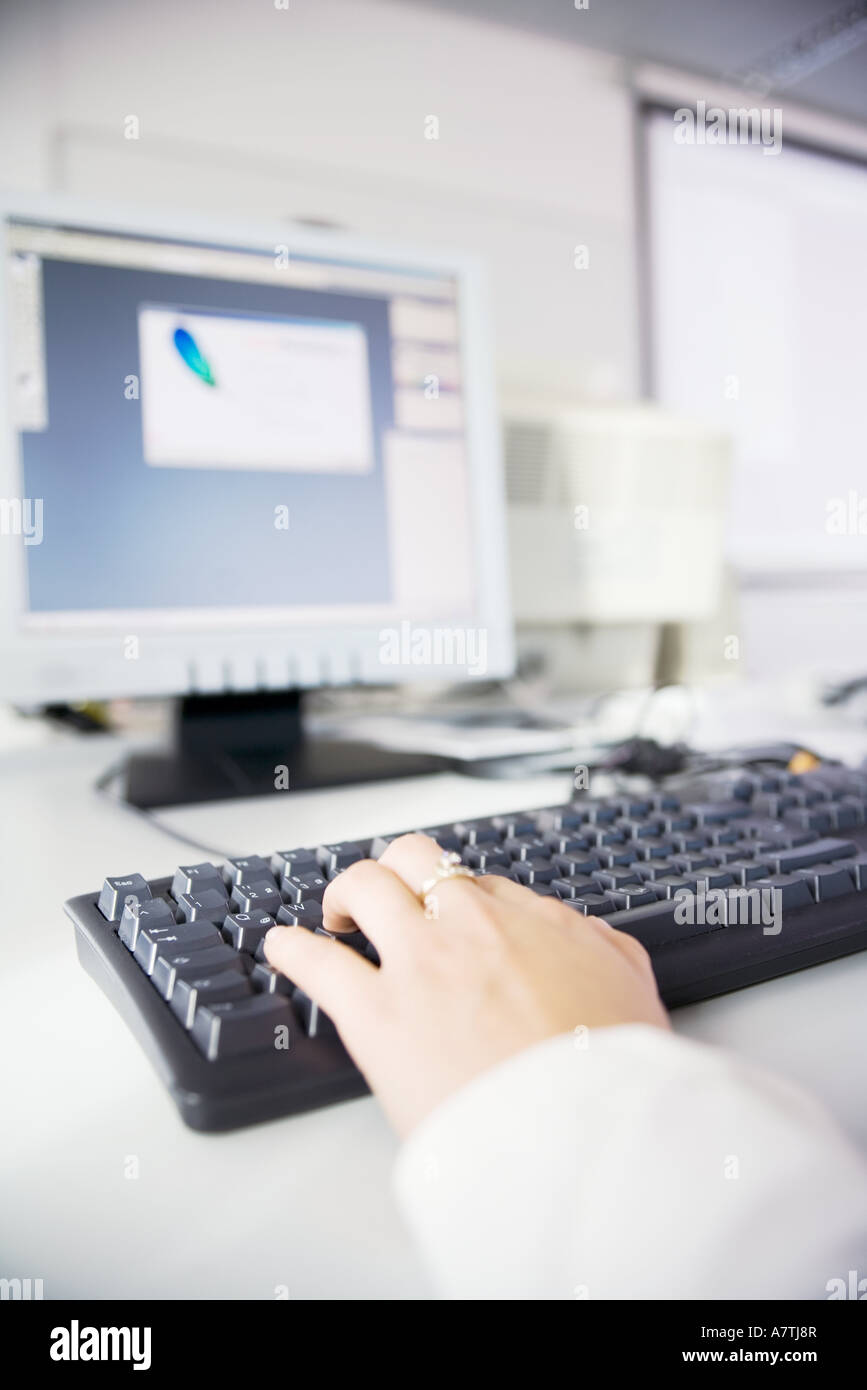 Person working on computer Stock Photo - Alamy