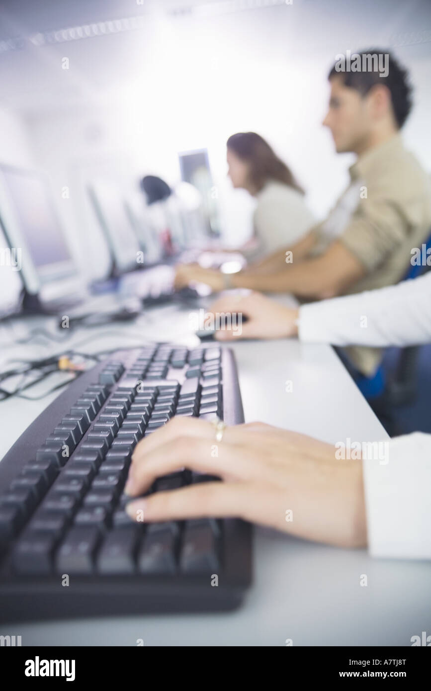 Group of people working on computers Stock Photo - Alamy