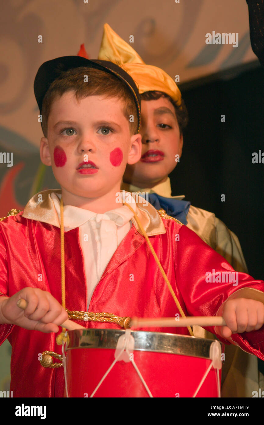 Schoolboys Dressed In Costume For School Play Performing On Stage Stock ...