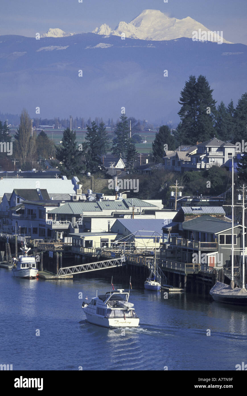 NA, USA, Washington, LaConner. The Swinomish Channel, with Mt. Baker in ...