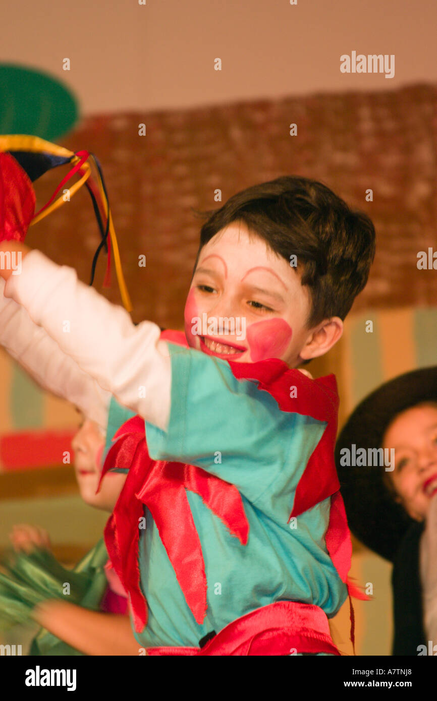 Schoolboy Dressed In Costume For School Play Performing On Stage Stock ...