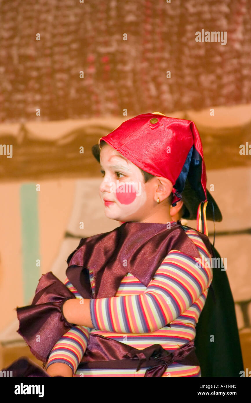 Schoolboy Dressed In Costume For School Play Performing On Stage Stock ...