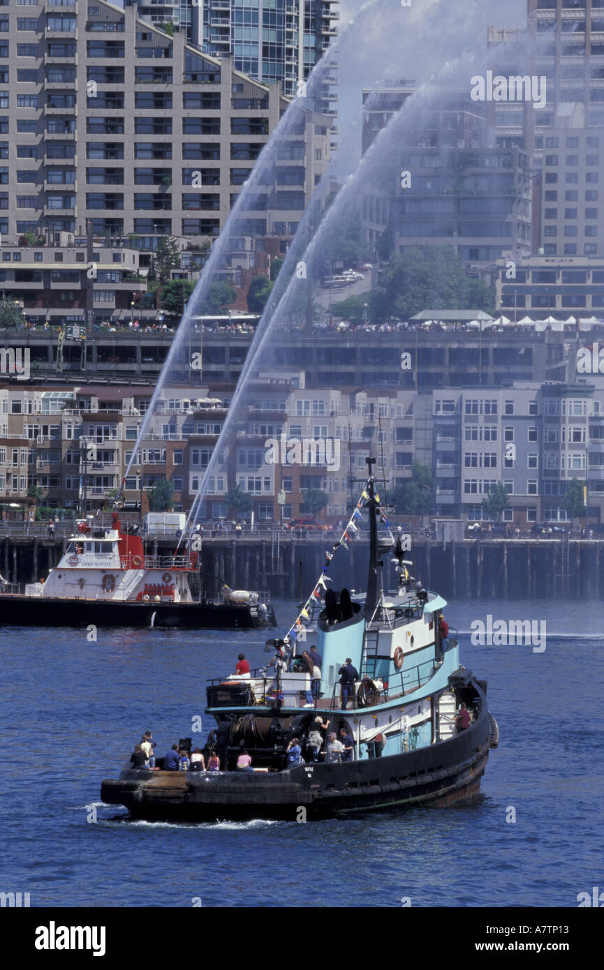 USA, WA, Seattle, Elliott Bay. Tugboat and firefighting boat Chief ...