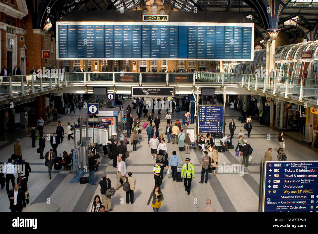 Inside Liverpool Street station looking towards information board Stock ...