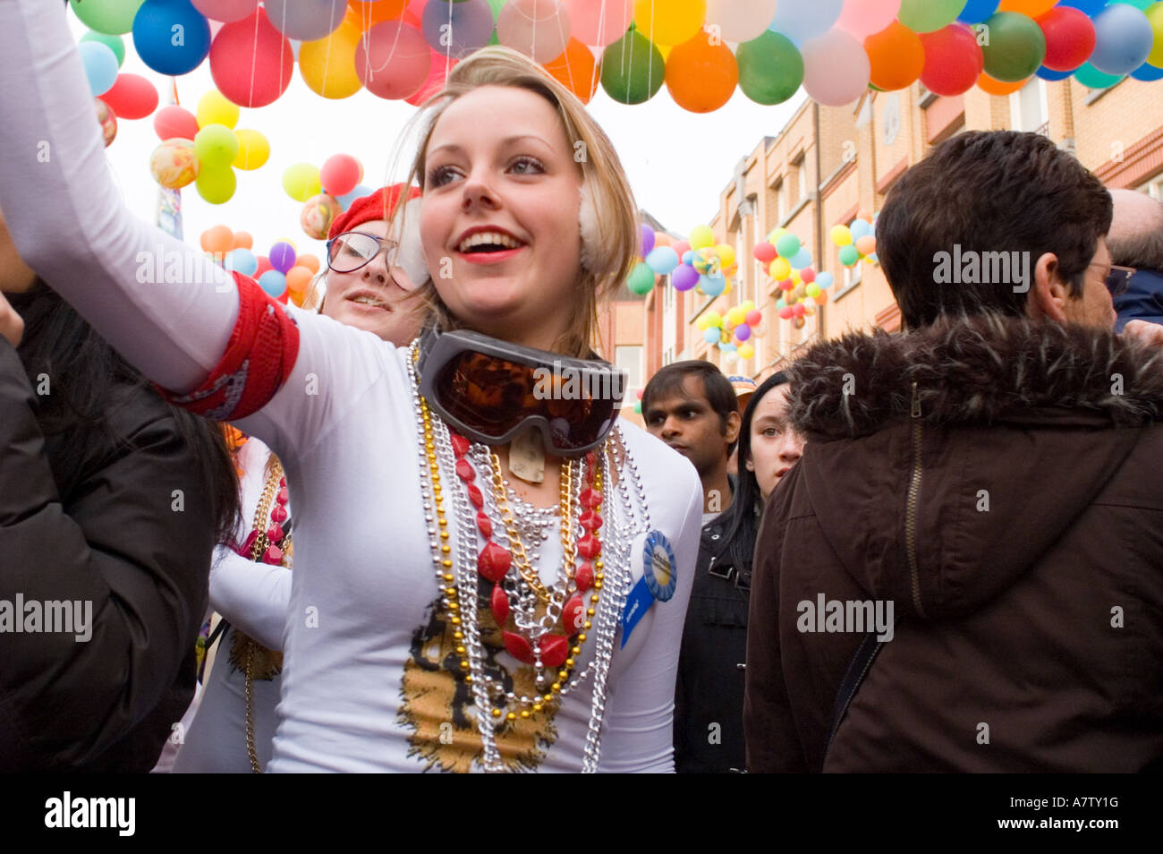 Girl in a crowd hi-res stock photography and images - Alamy