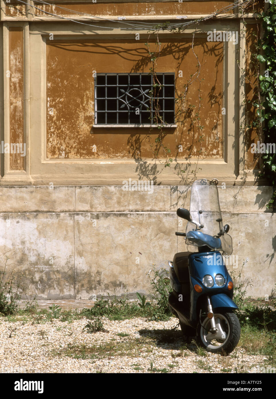 Rome, Lazio, Italy. Villa Borghese. Motor Scooter parked by wall Stock ...