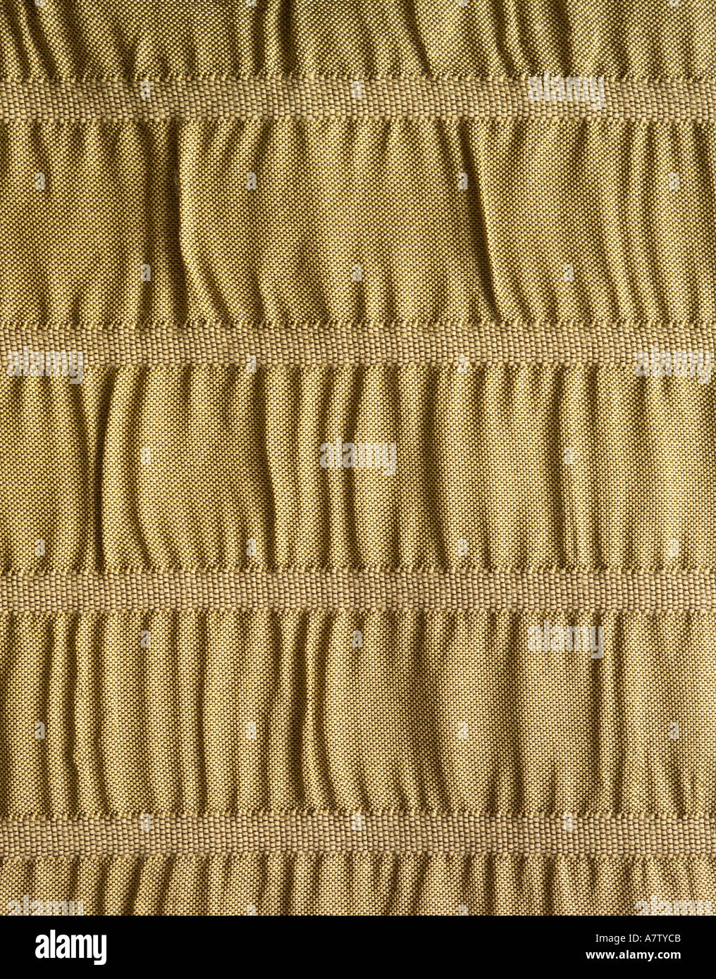 gold silk gathered fabric swatch Stock Photo - Alamy