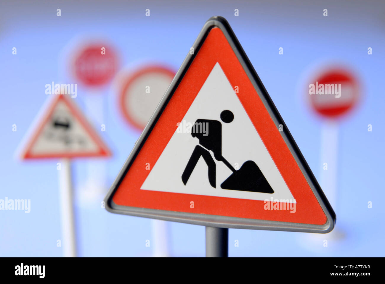 Close-up of construction worker sign Stock Photo - Alamy